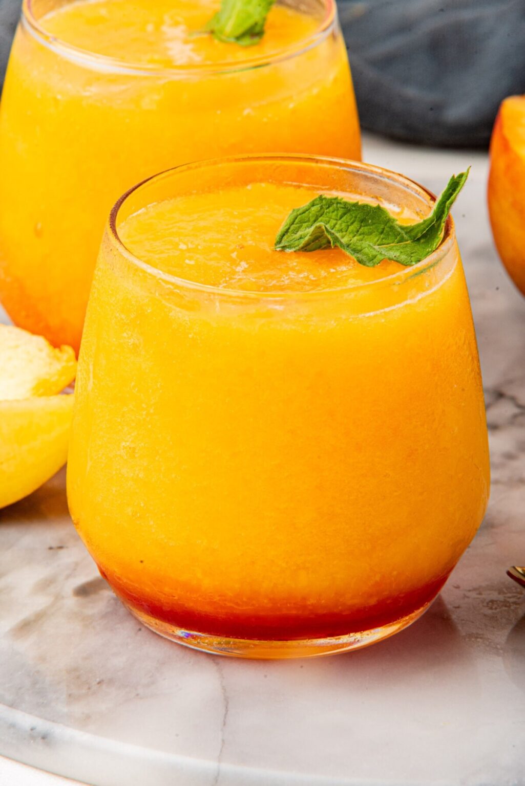 The Best Frozen Peach Bellini Cocktail Recipe - Kara Creates